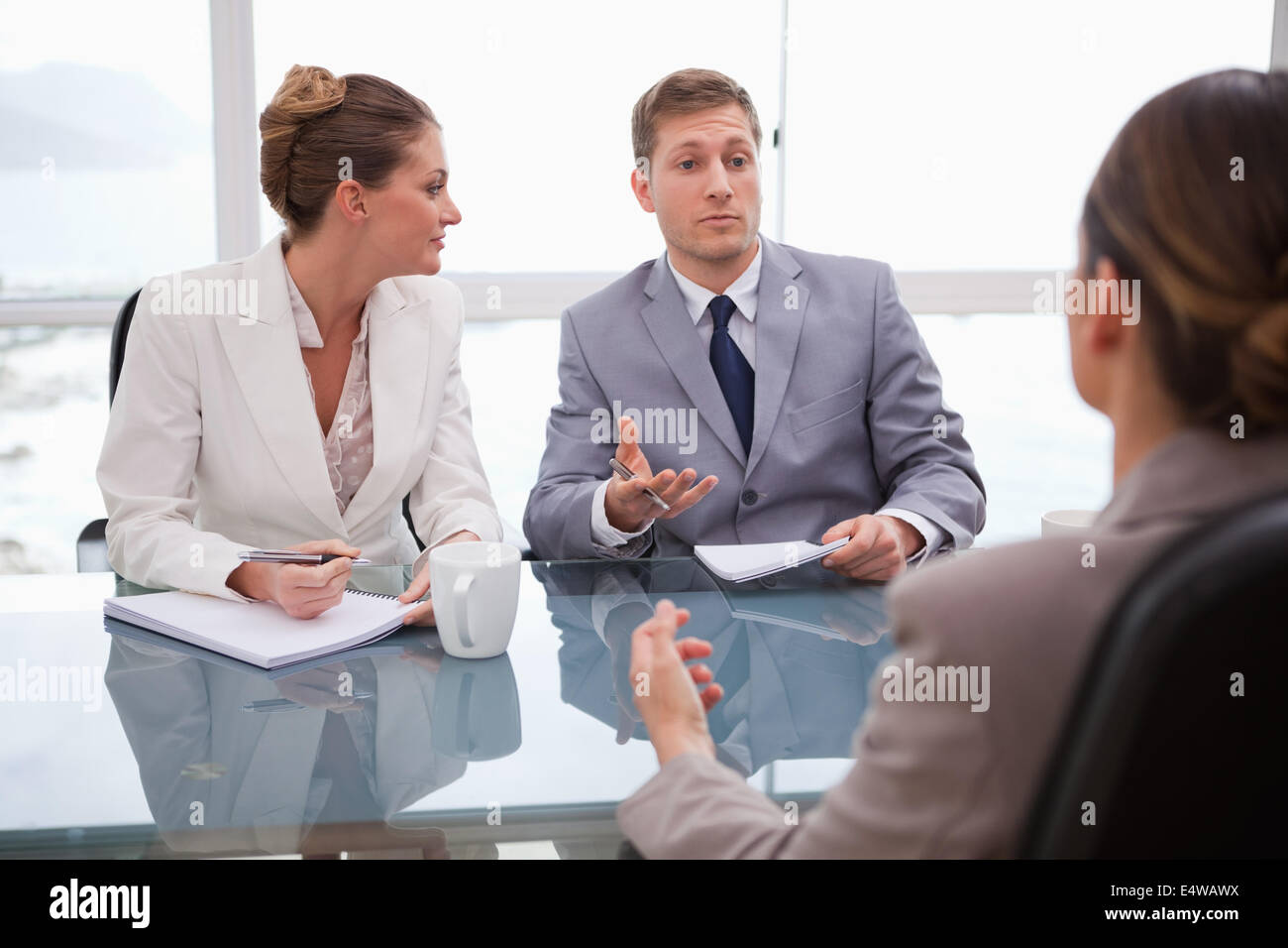 Business partners talking with lawyer Stock Photo - Alamy