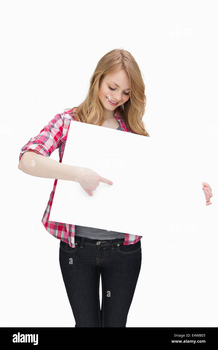 Woman looking at a blank board Stock Photo - Alamy