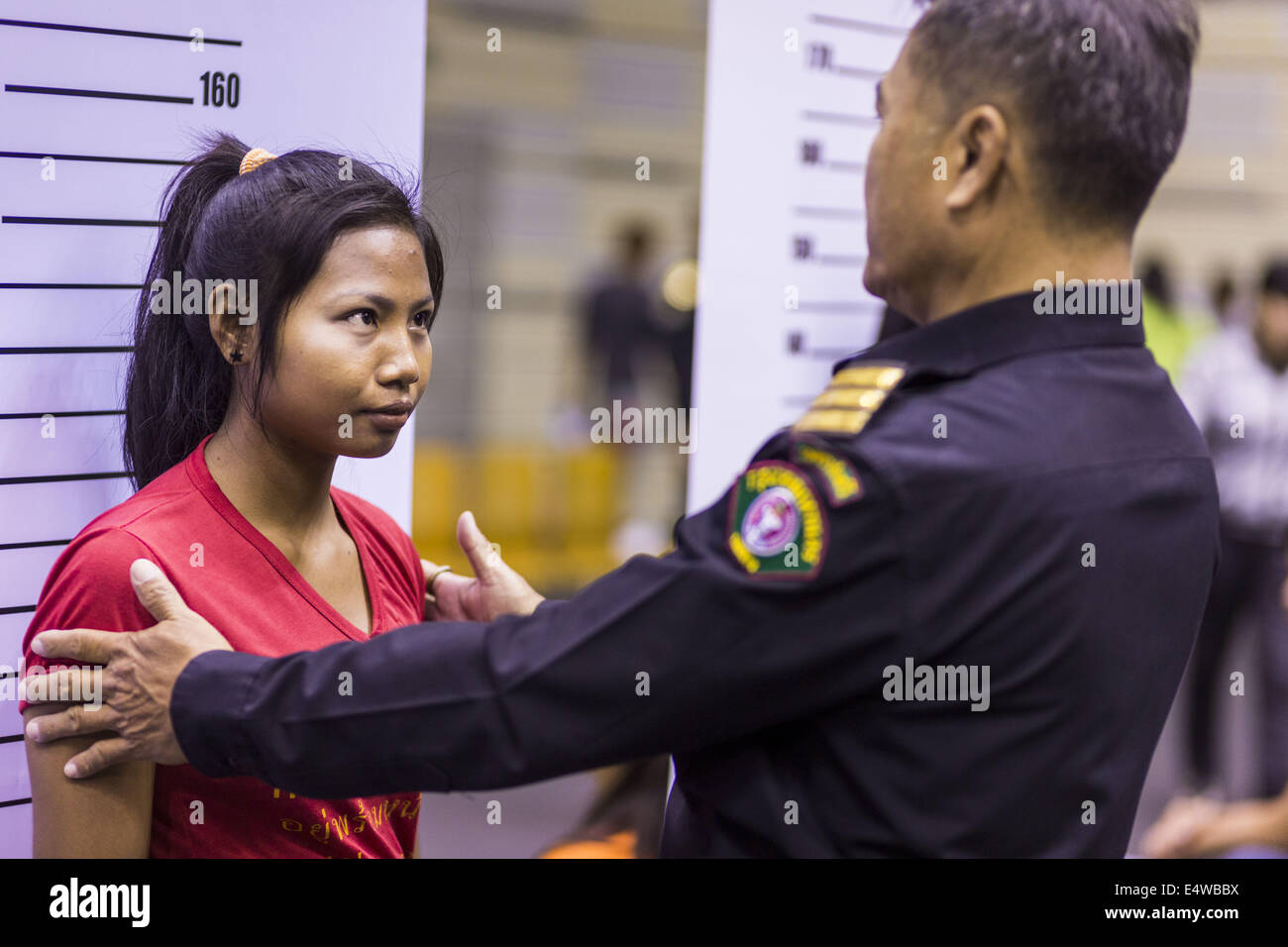 July 17, 2014 - Bangkok, Bangkok, Thailand - A Thai immigration police ...