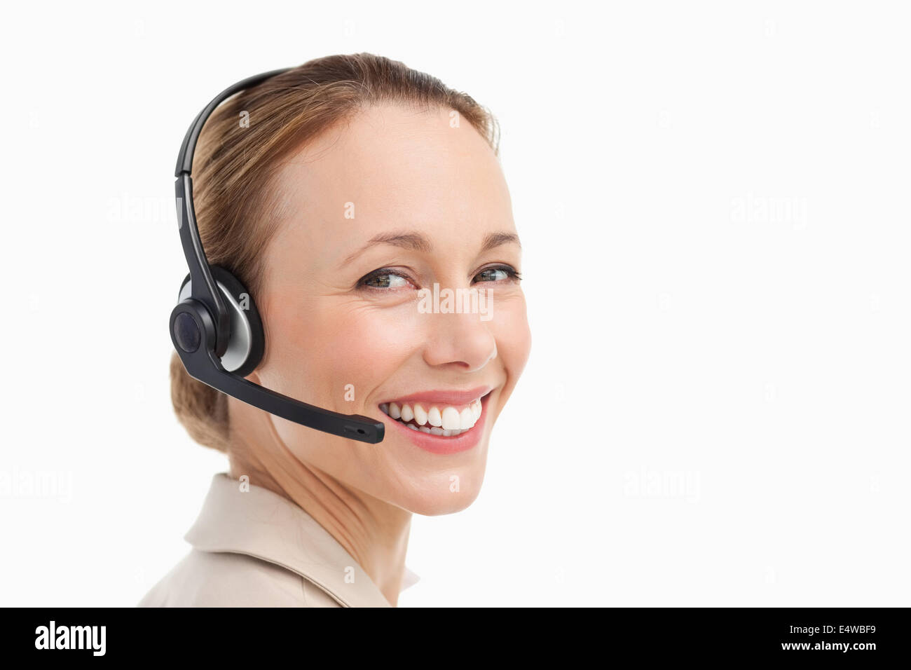 Portrait of a woman in a suit with headset Stock Photo - Alamy