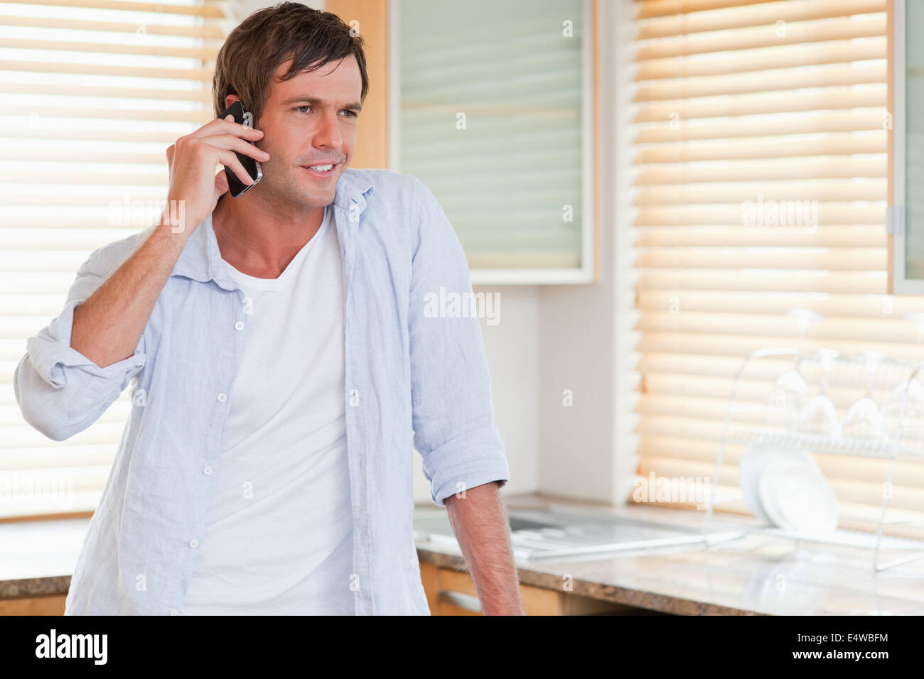 Man making a phone call Stock Photo - Alamy