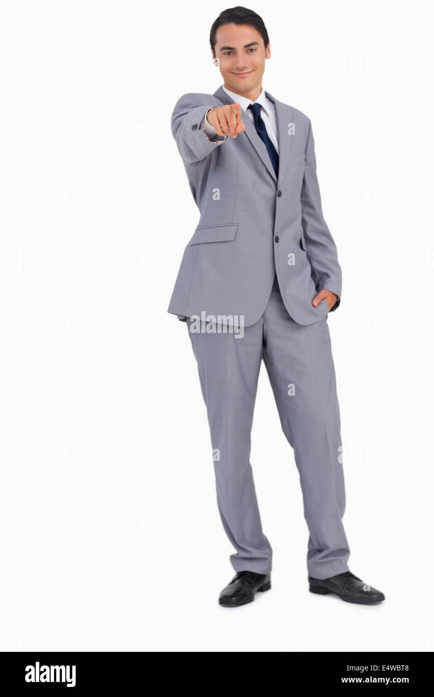 Good-looking man pointing in front of him Stock Photo - Alamy