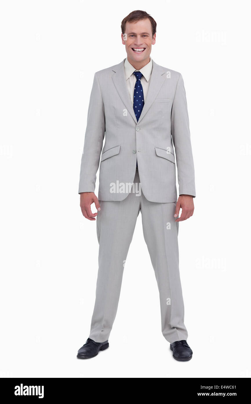 Smiling businessman standing Stock Photo - Alamy