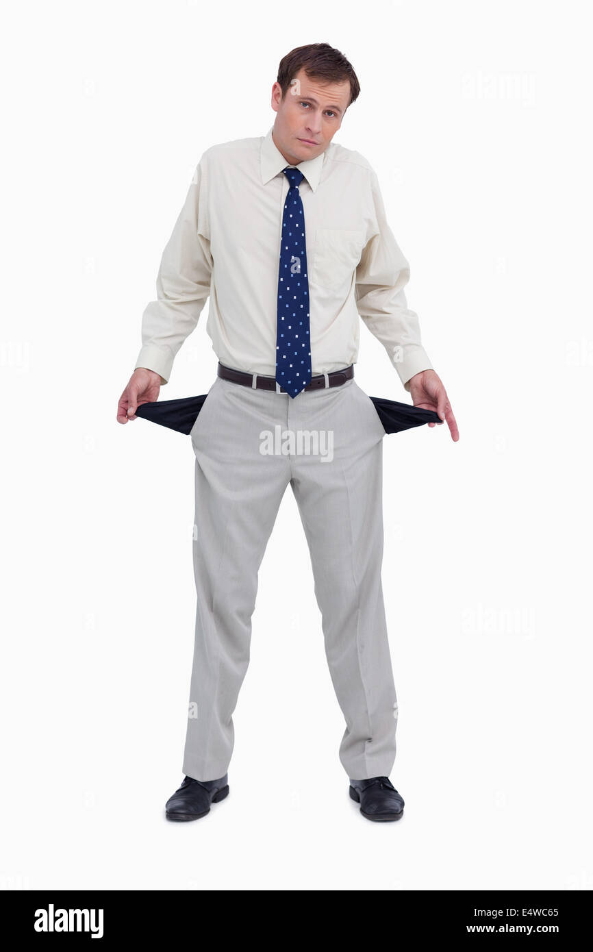 Sad businessman showing his empty pockets Stock Photo - Alamy