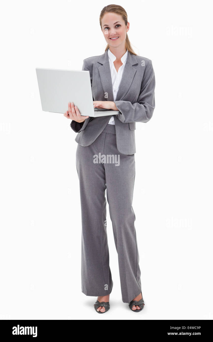 Smiling bank employee with laptop Stock Photo - Alamy