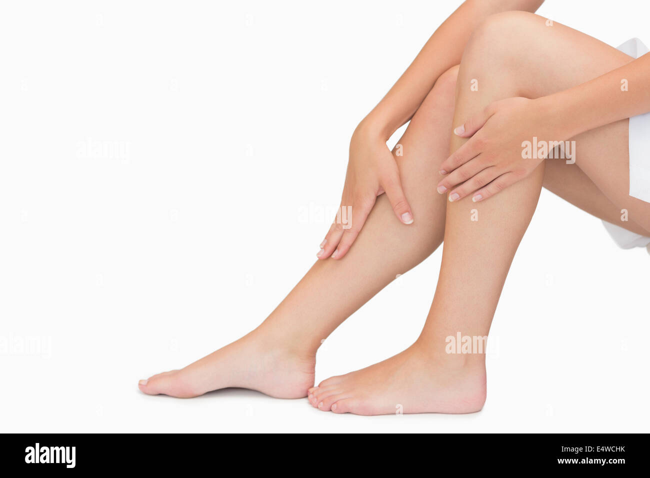 Woman sitting showing legs hi-res stock photography and images - Alamy