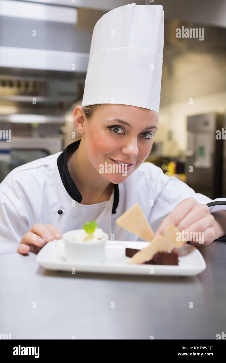 Happy chef finishing desert Stock Photo - Alamy