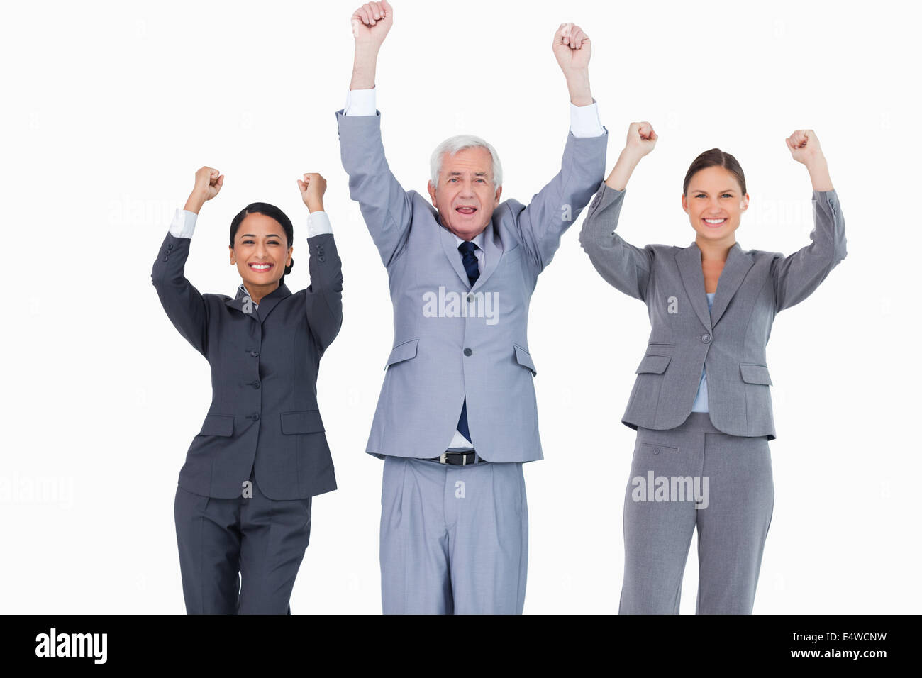 Three cheering businesspeople Stock Photo - Alamy
