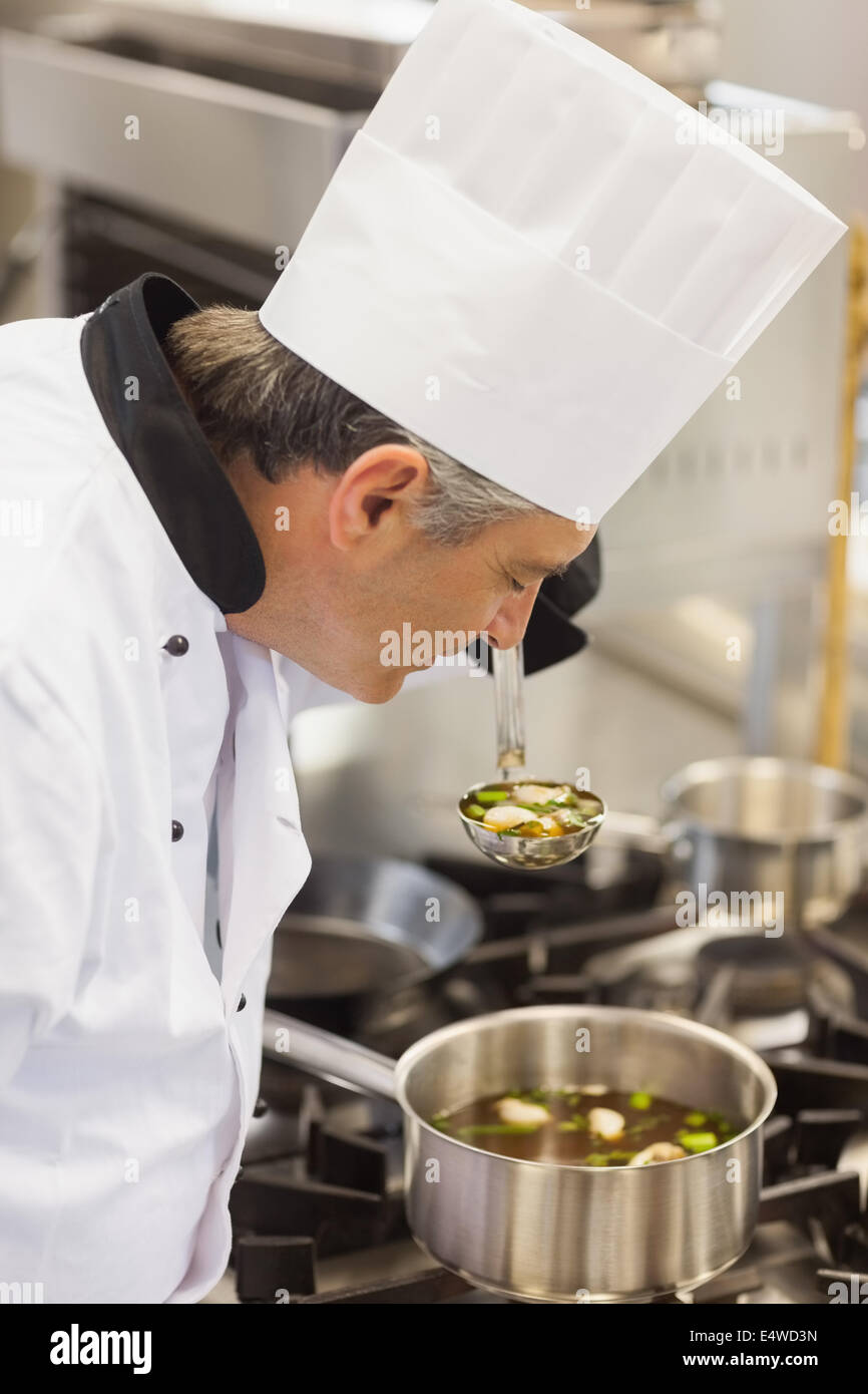 Chef smelling soup Stock Photo - Alamy