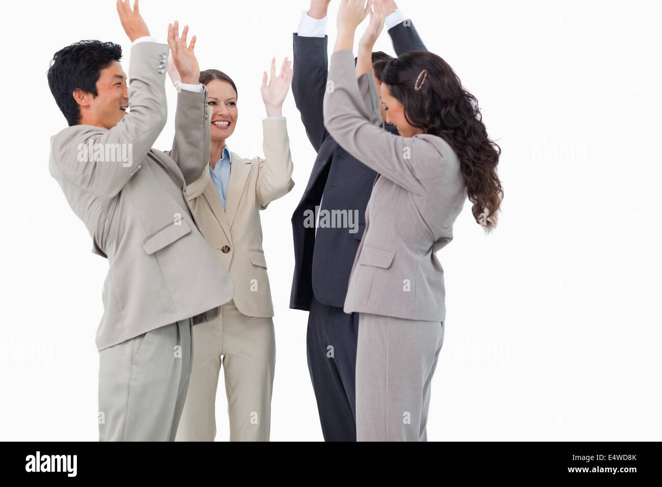 Businesspeople doing self-motivation ritual Stock Photo - Alamy