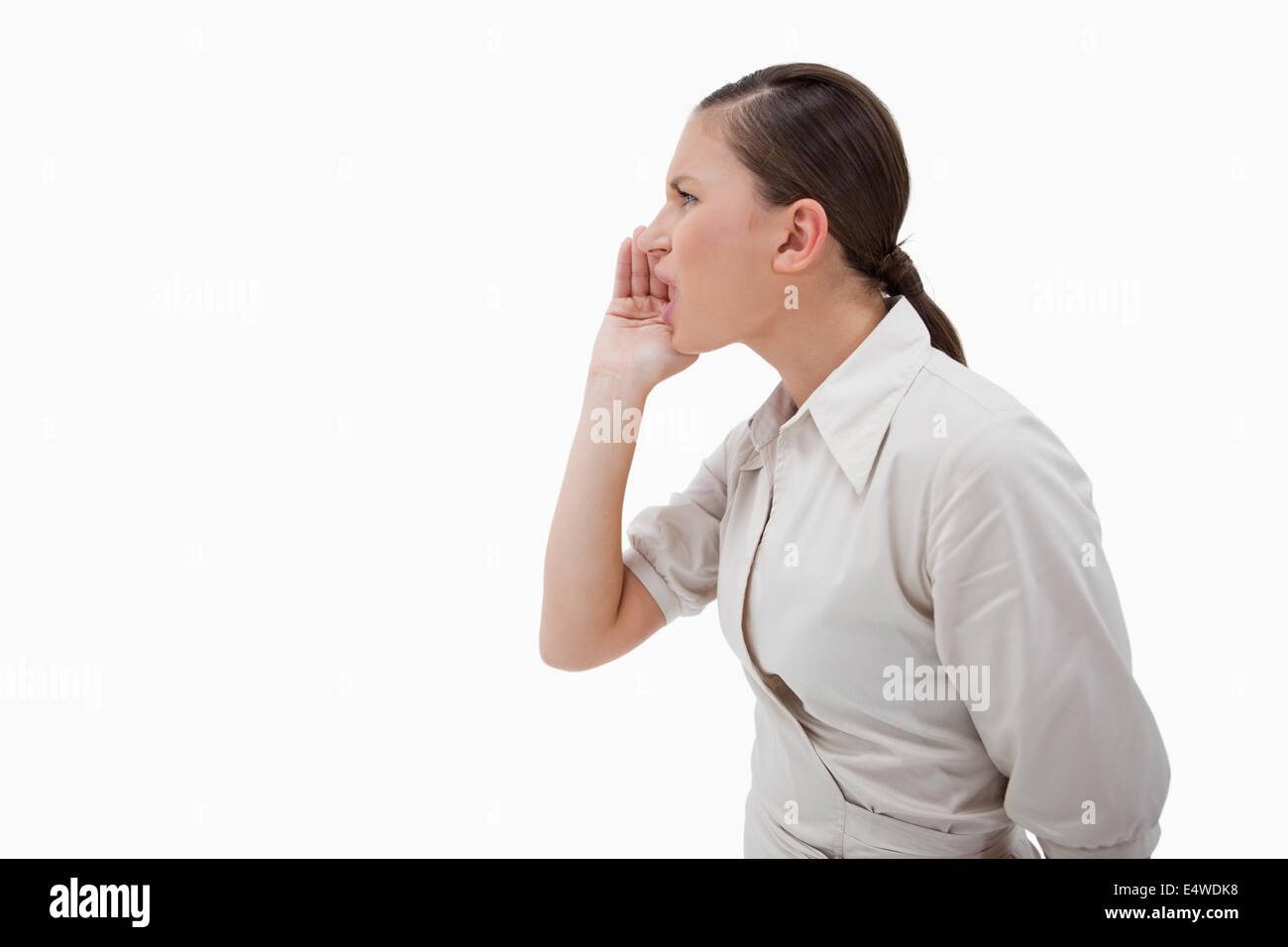 Side view of a businesswoman shouting Stock Photo - Alamy
