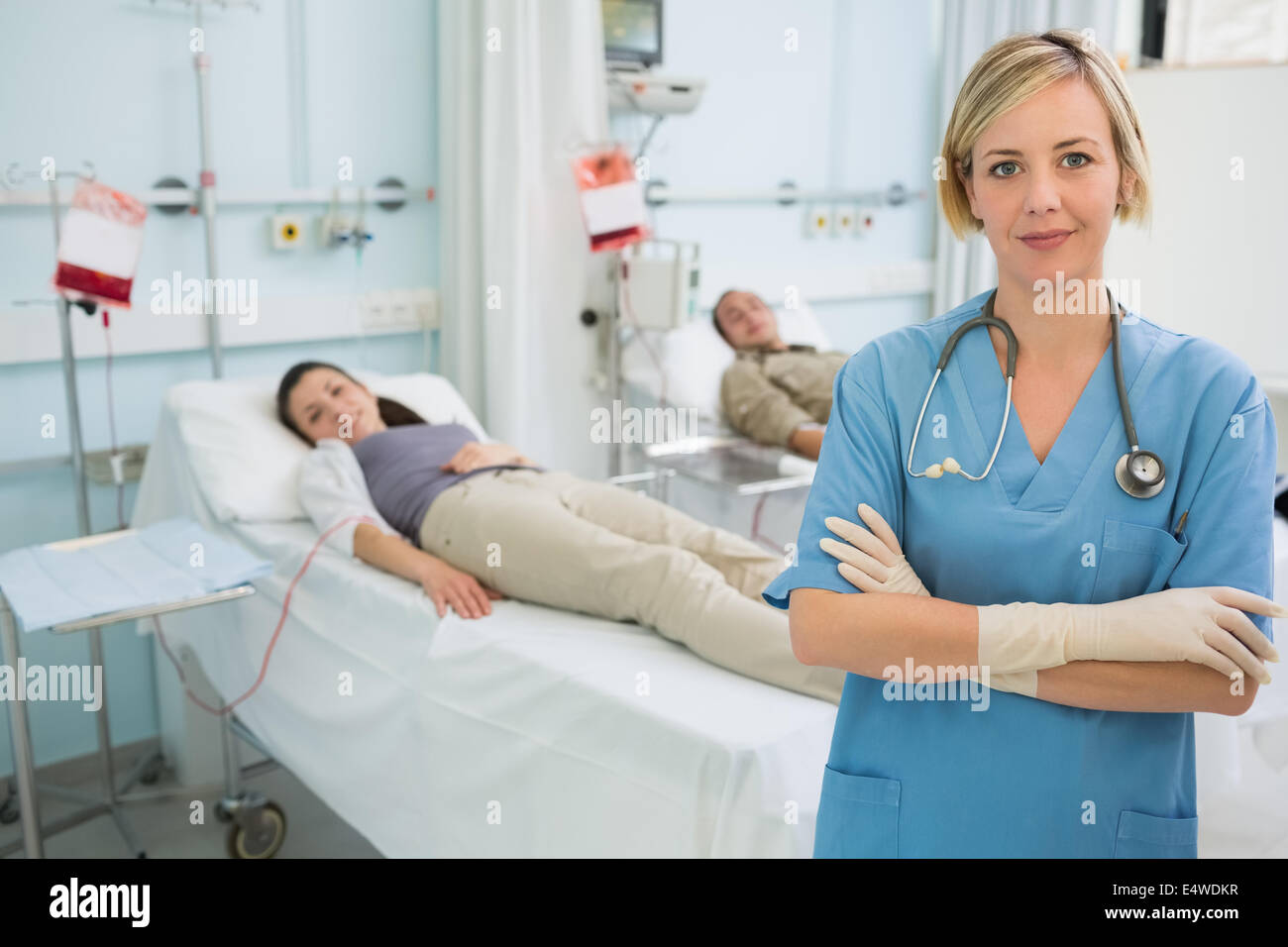 Nurse with arms crossed Stock Photo - Alamy