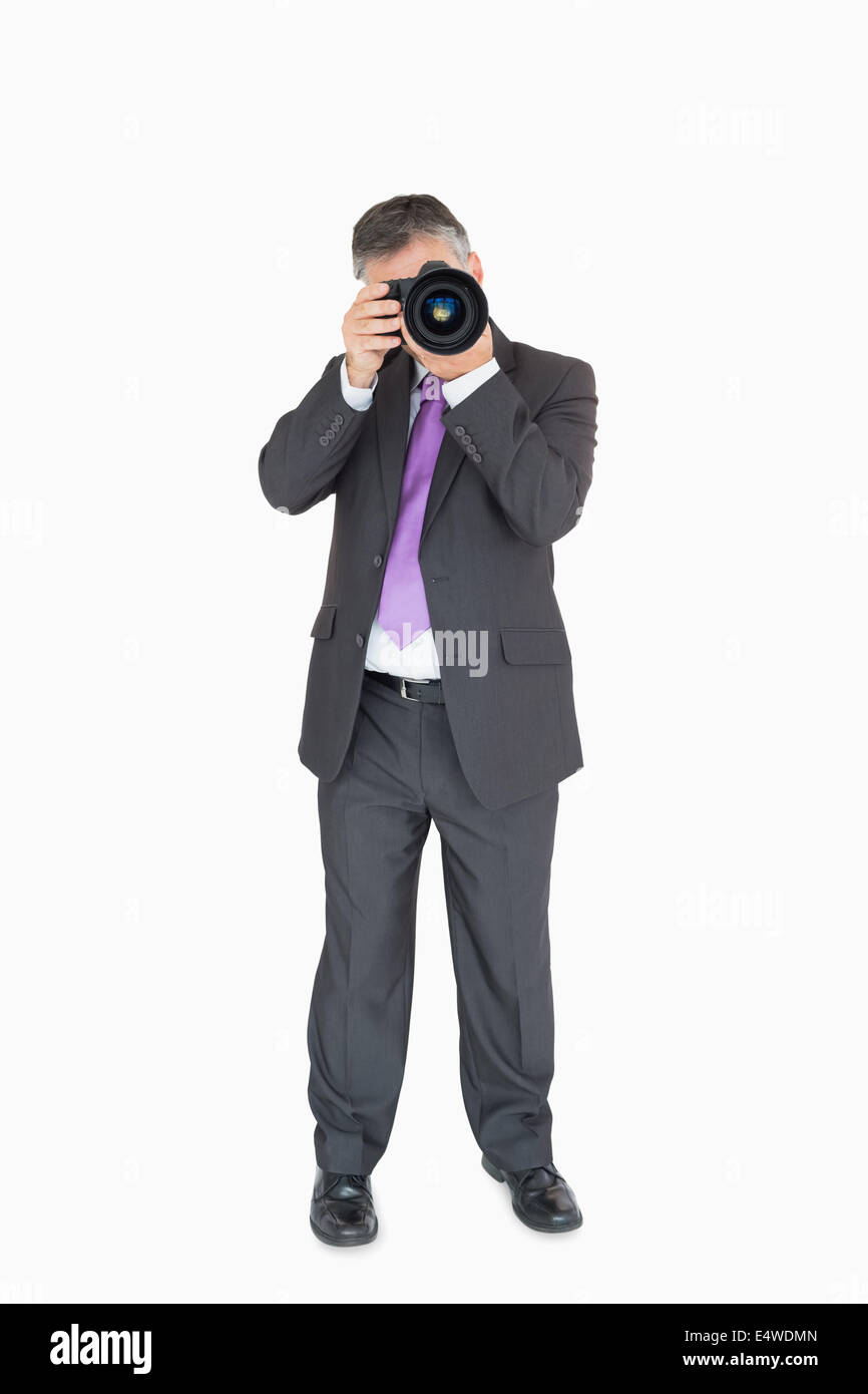 Man using camera Stock Photo - Alamy