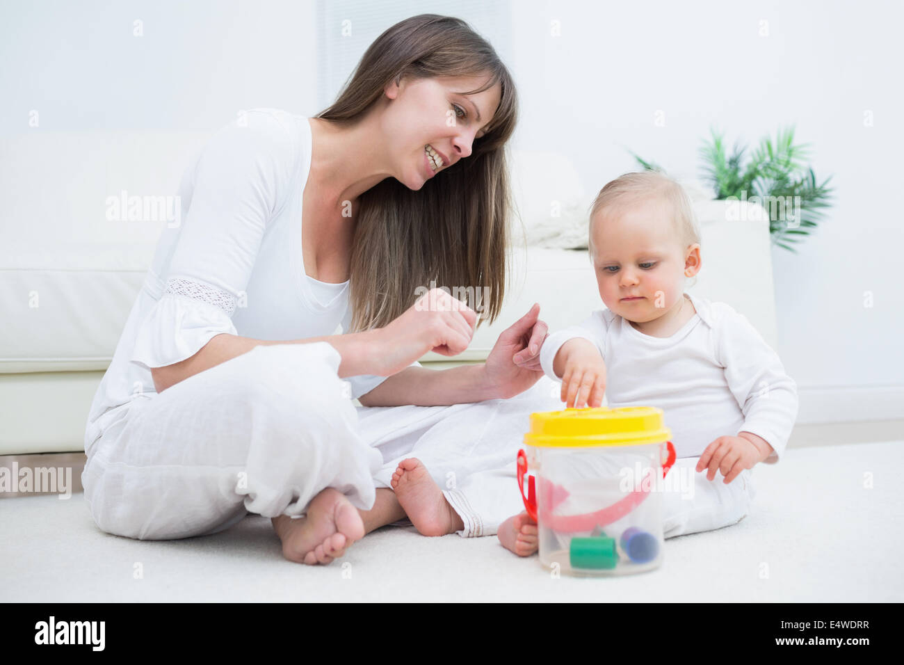 Baby girl mother playing laughing hi-res stock photography and images ...