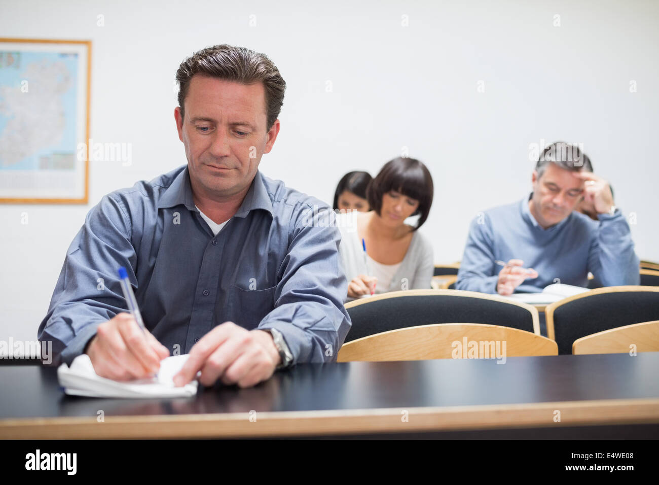 Adults in classroom hi-res stock photography and images - Alamy
