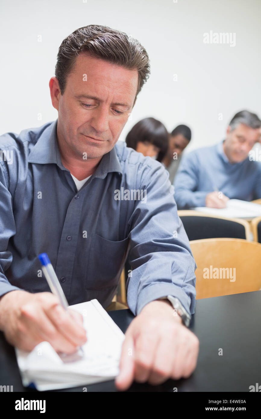 Man taking notes Stock Photo - Alamy