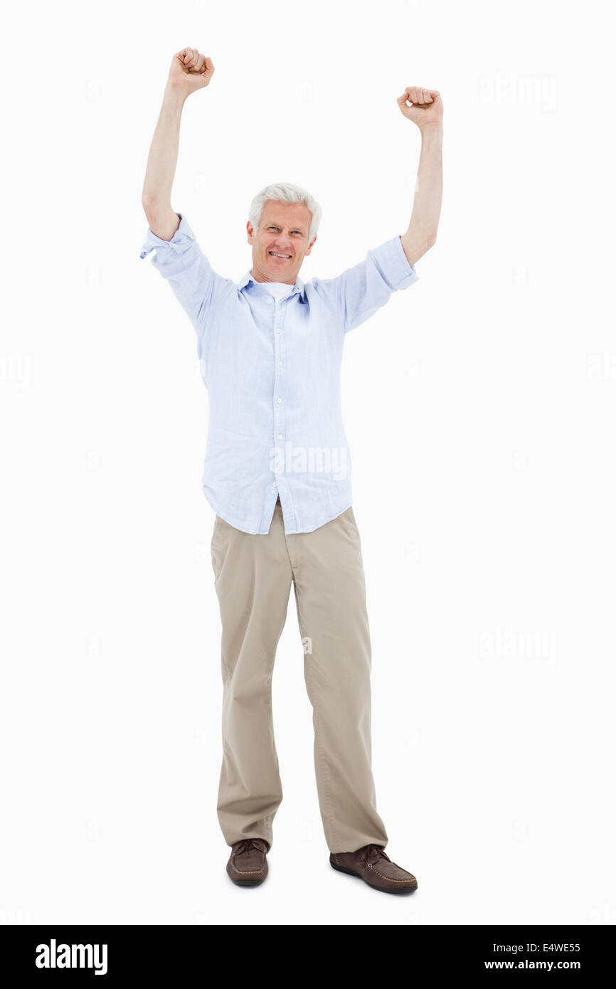 Portrait of a mature man with the arms up Stock Photo - Alamy