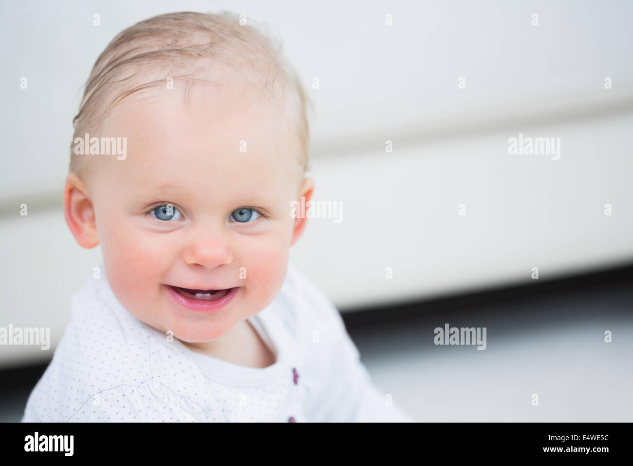 Blonde baby with blue eyes Stock Photo - Alamy