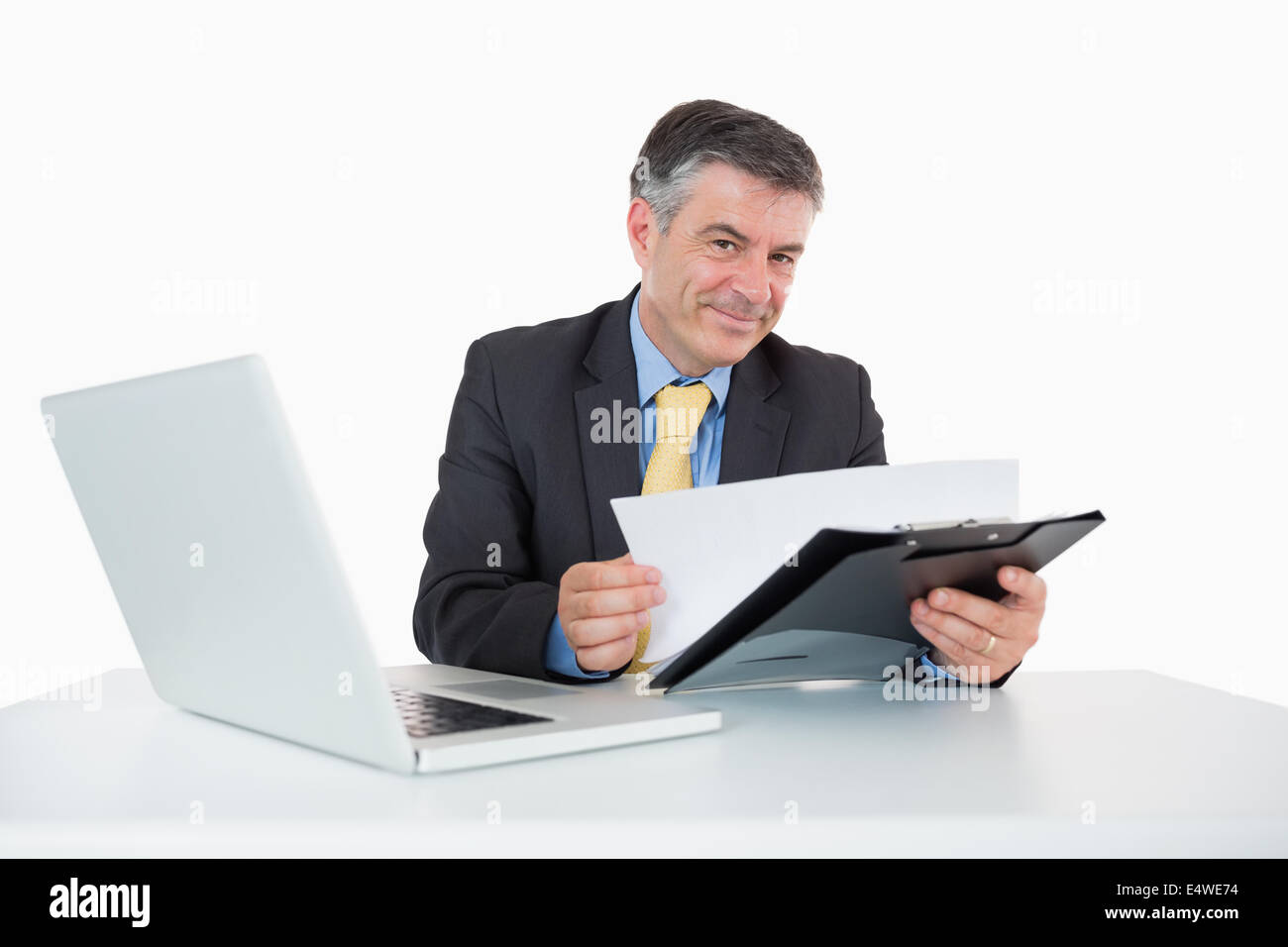 Mature executive reading documents hi-res stock photography and images ...