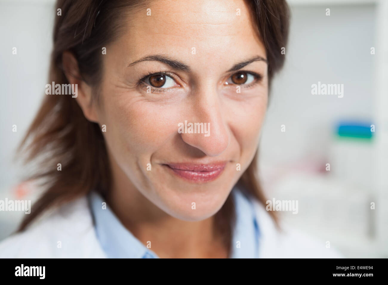 Female doctor smiling Stock Photo - Alamy