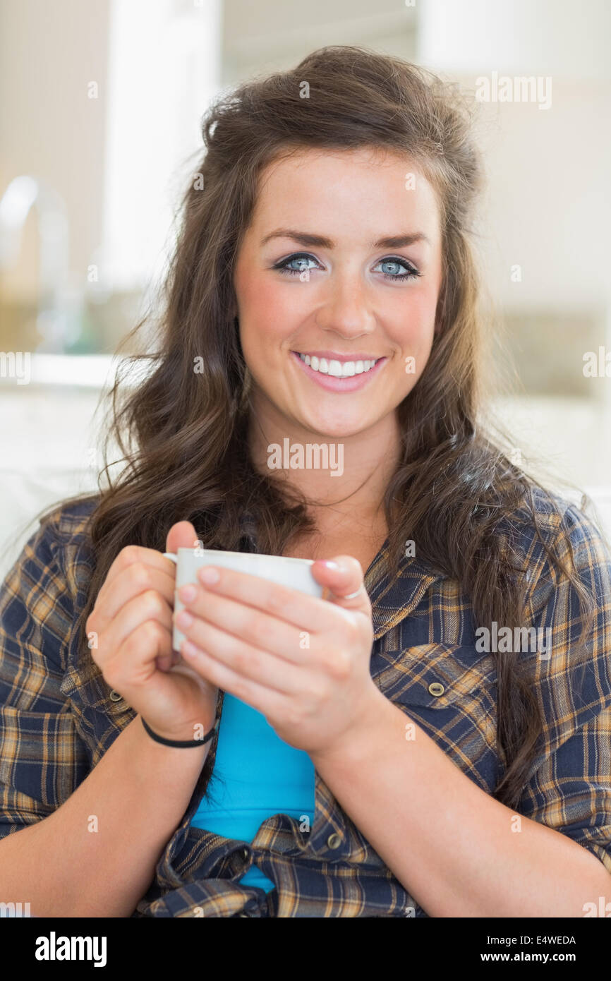 Woman holding mug two hands hi-res stock photography and images - Alamy
