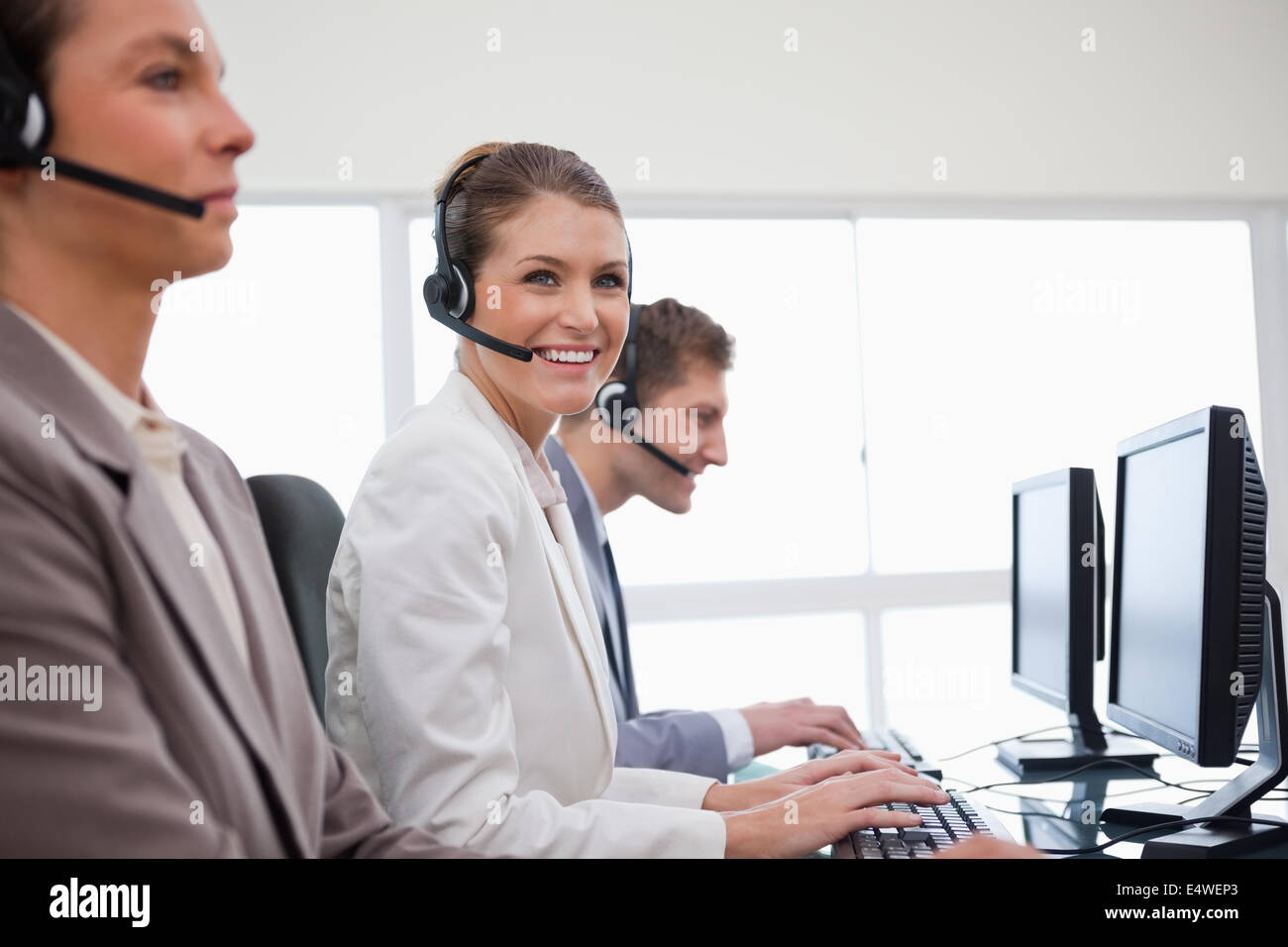 Call center office side view hi-res stock photography and images - Alamy