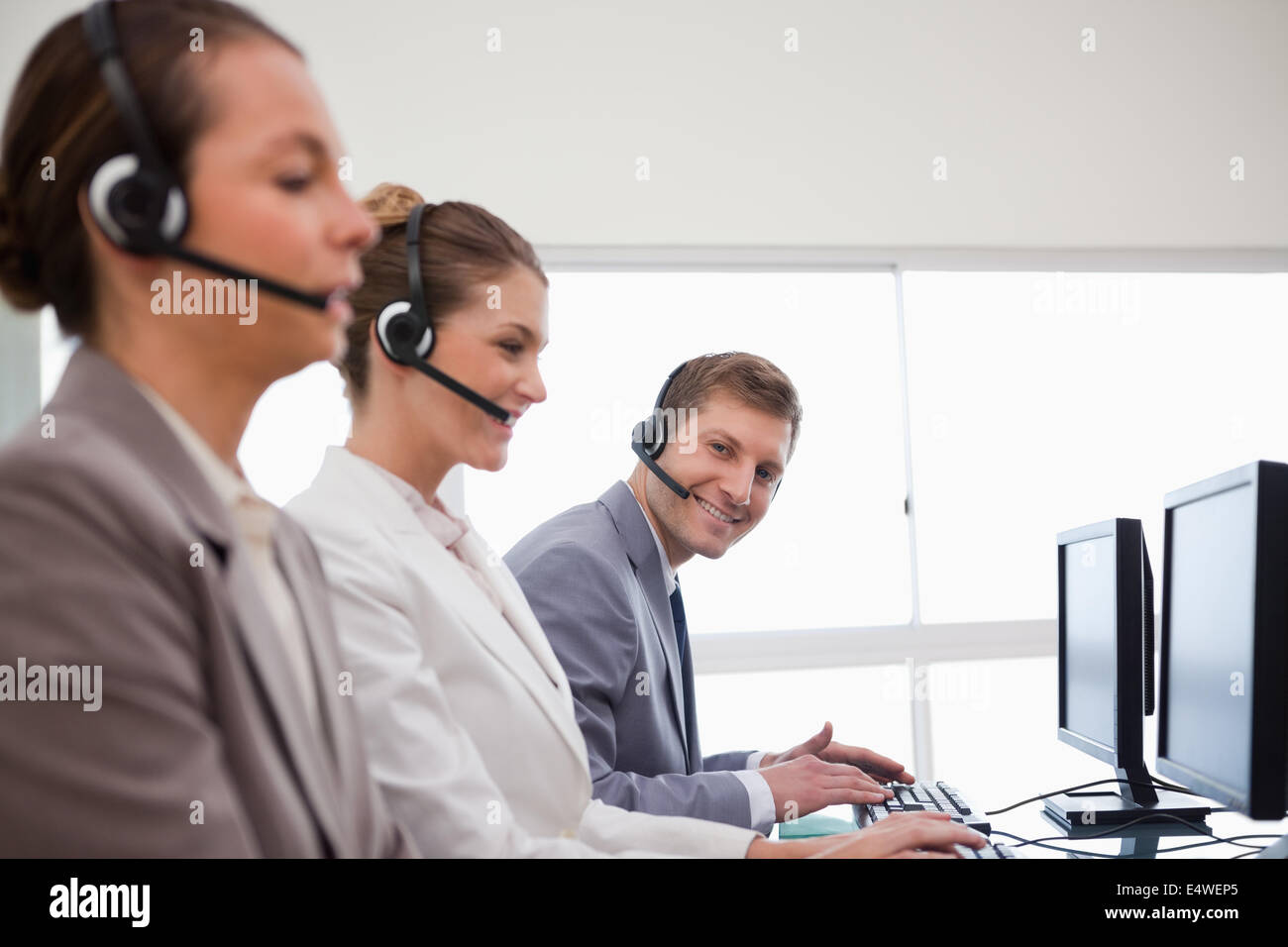 Side view young call center hi-res stock photography and images - Alamy