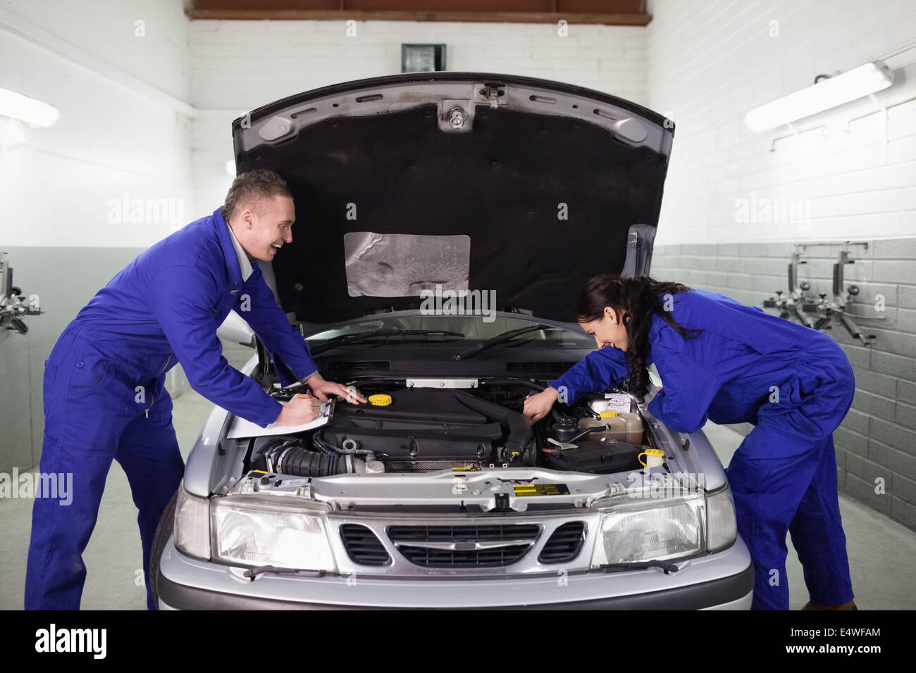 Examining the r hi-res stock photography and images - Alamy