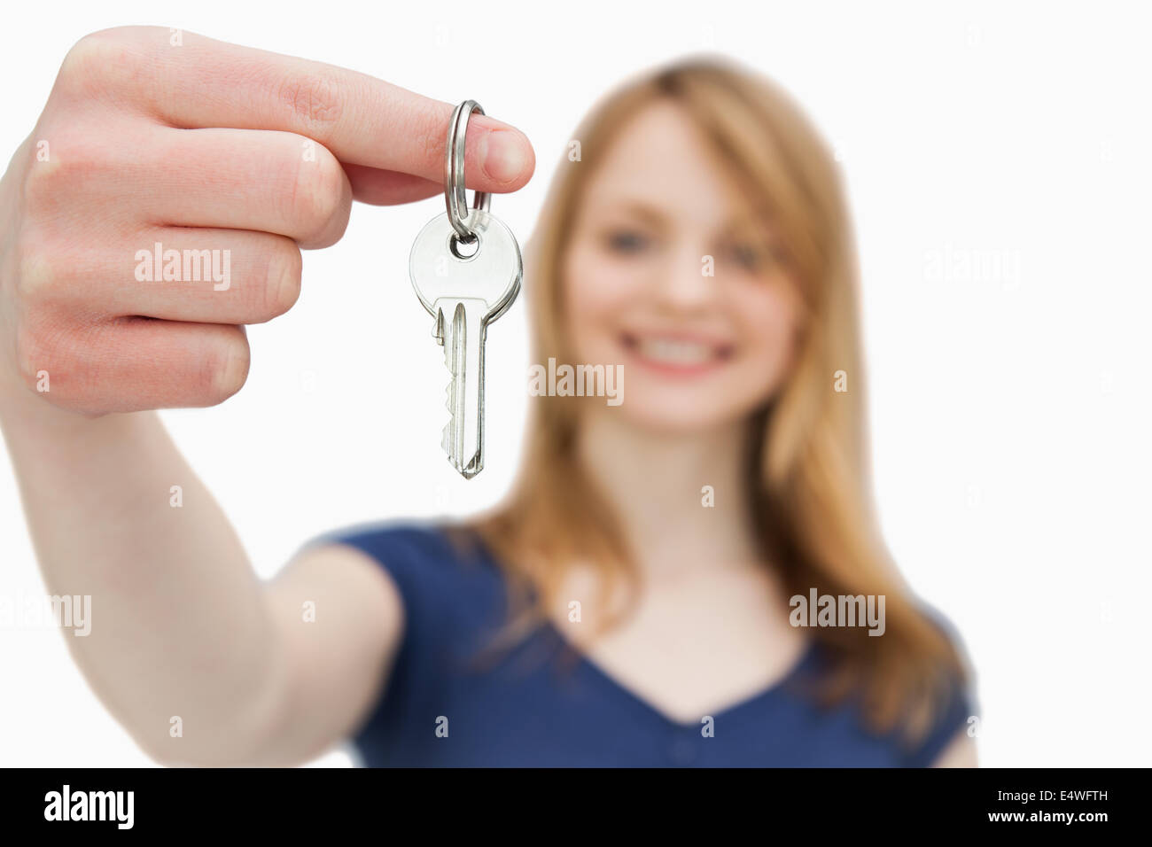 Young blonde woman holding keys hi-res stock photography and images - Alamy