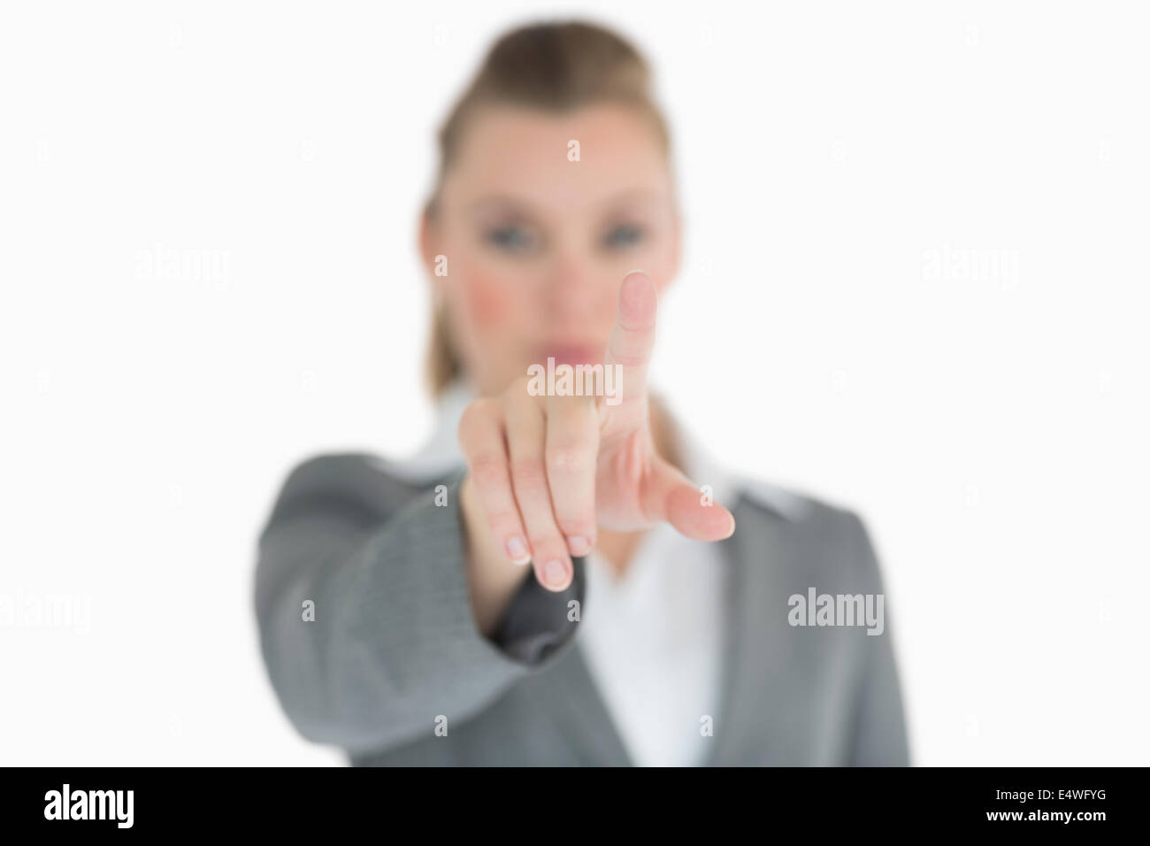 Woman pointing on something Stock Photo - Alamy