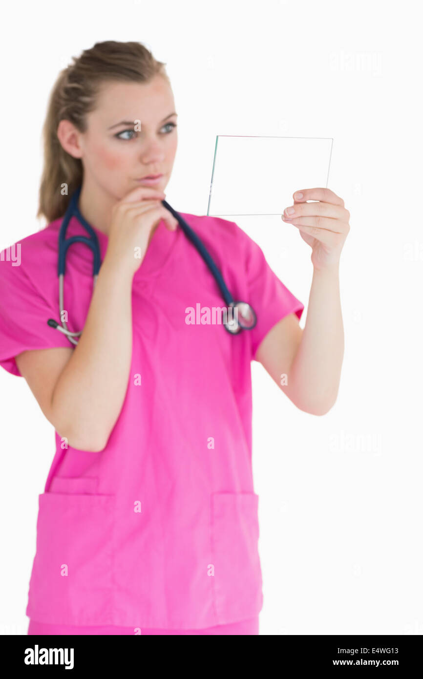 Doctor viewing glass slide Stock Photo - Alamy