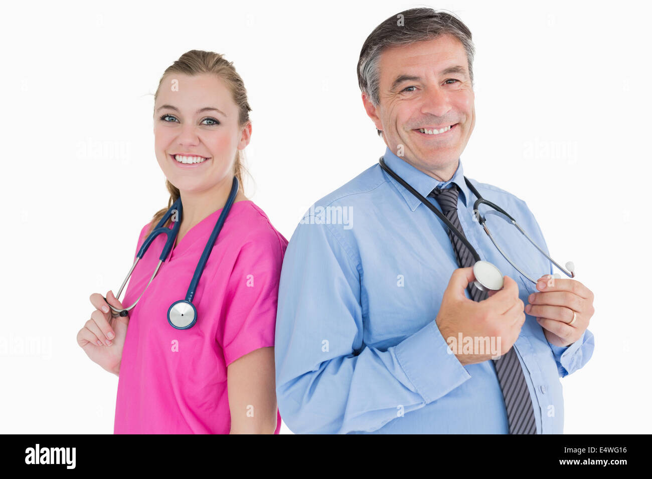Two happy doctors looking camera hi-res stock photography and images ...