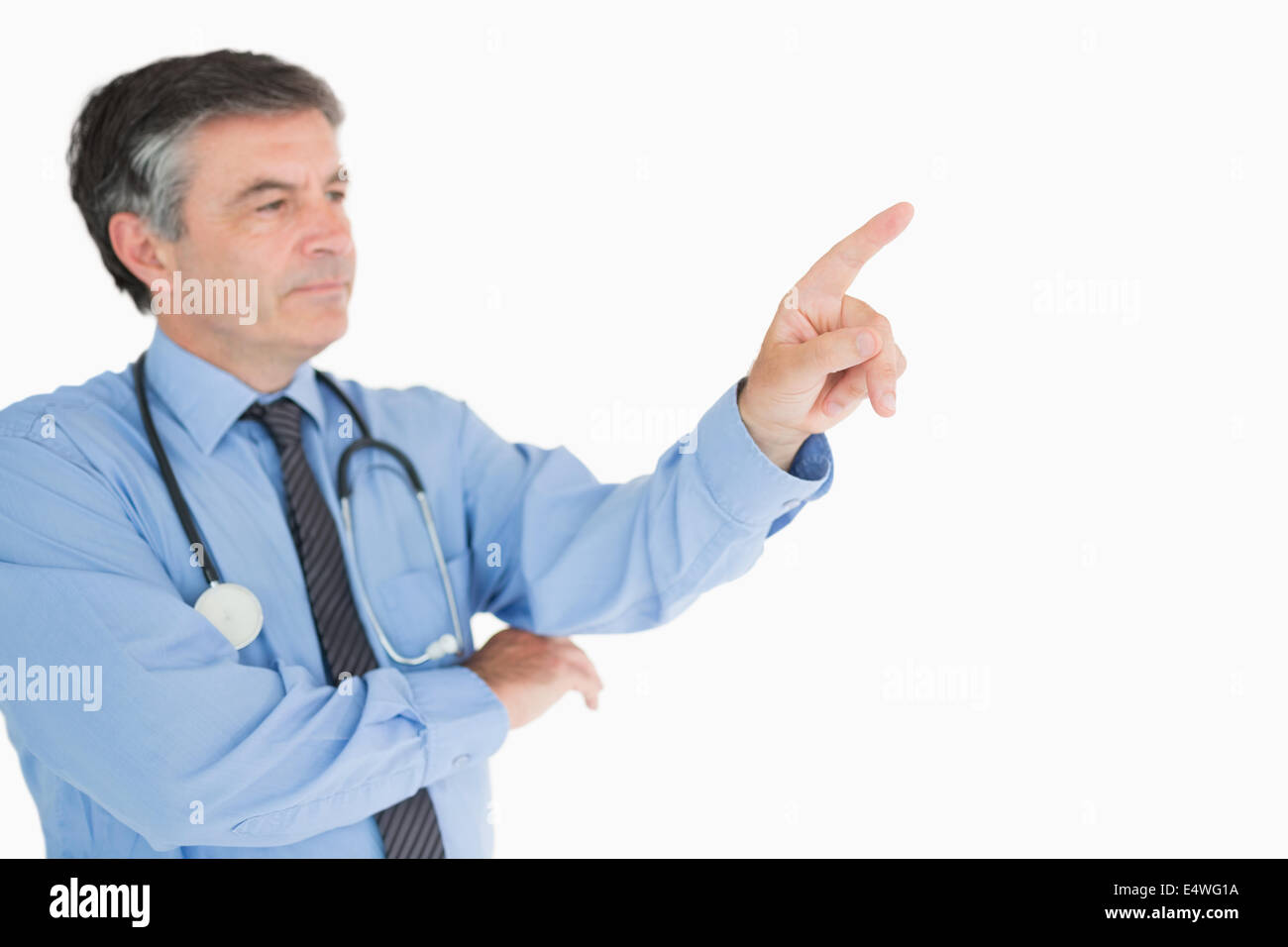 Doctor pointing at something Stock Photo - Alamy