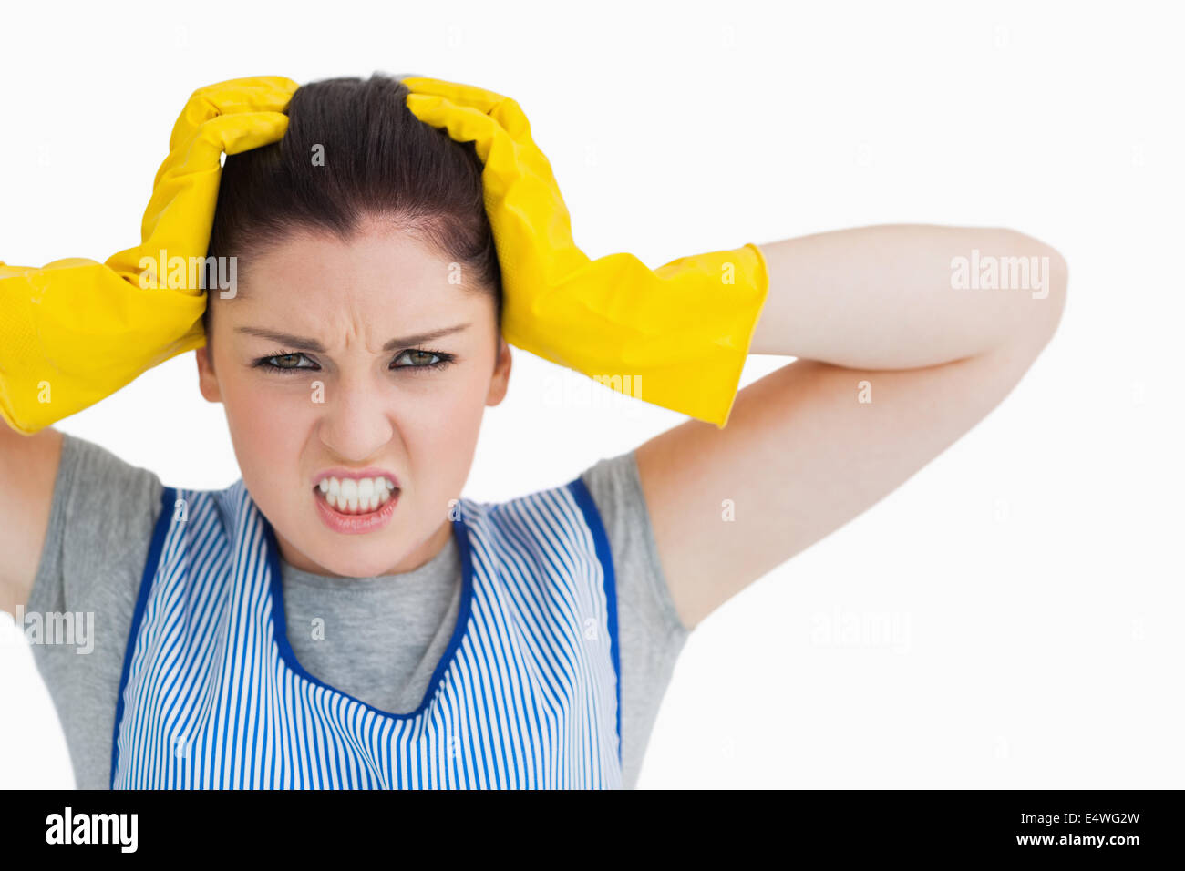 Angry cleaning woman looking at camera Stock Photo - Alamy