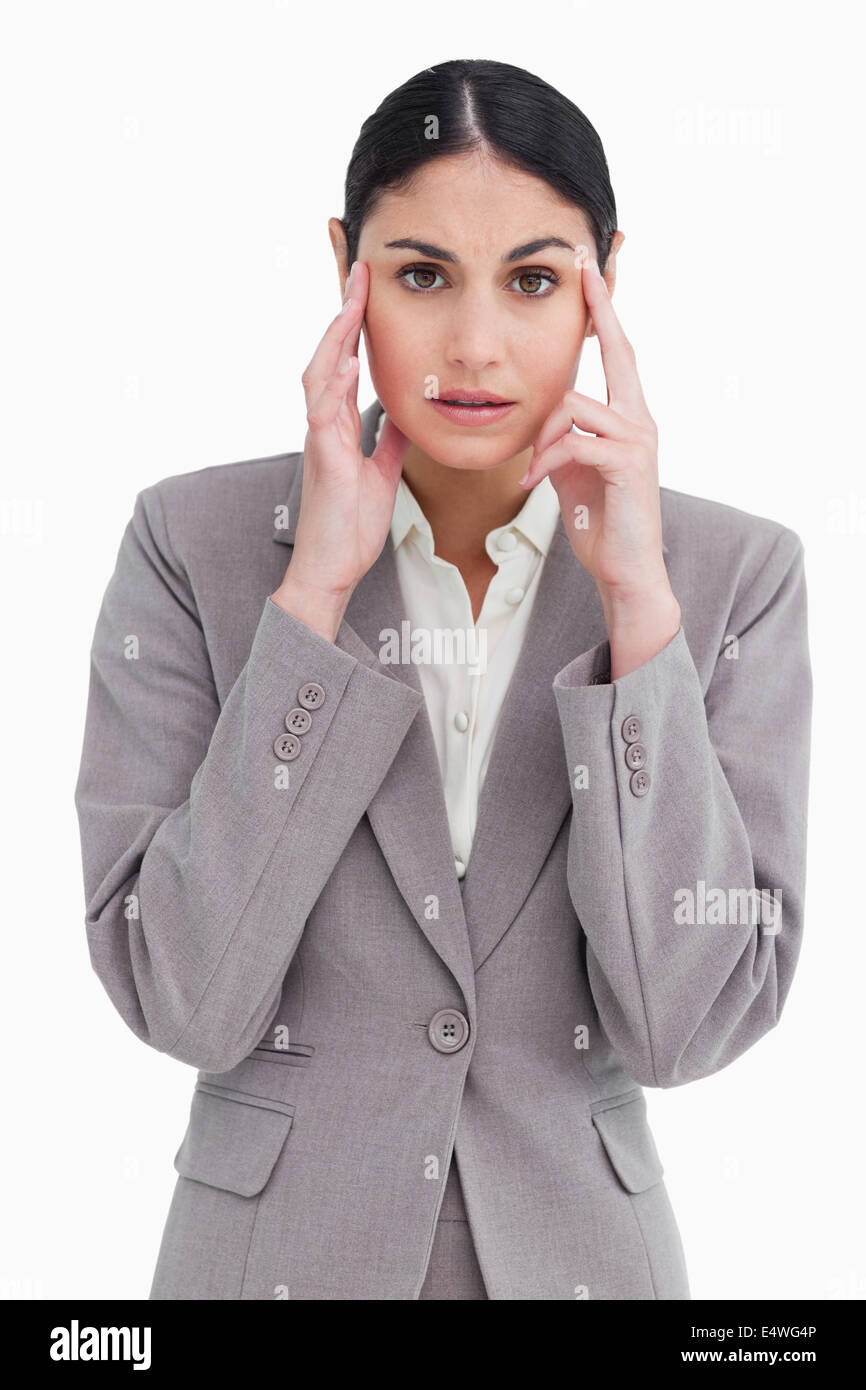 Young saleswoman with headache Stock Photo - Alamy