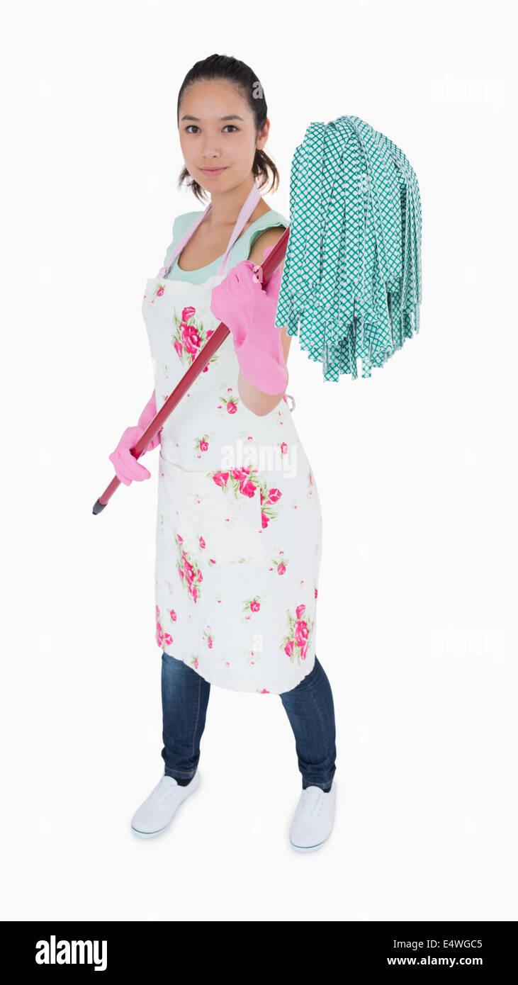 Woman holding a mop in the air Stock Photo - Alamy