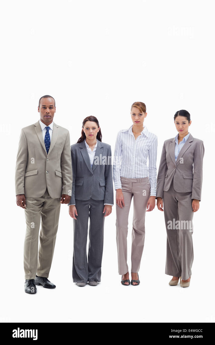 Serious business team side by side Stock Photo - Alamy