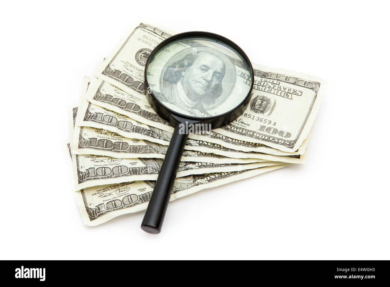 Magnifying glass object money Cut Out Stock Images & Pictures - Alamy