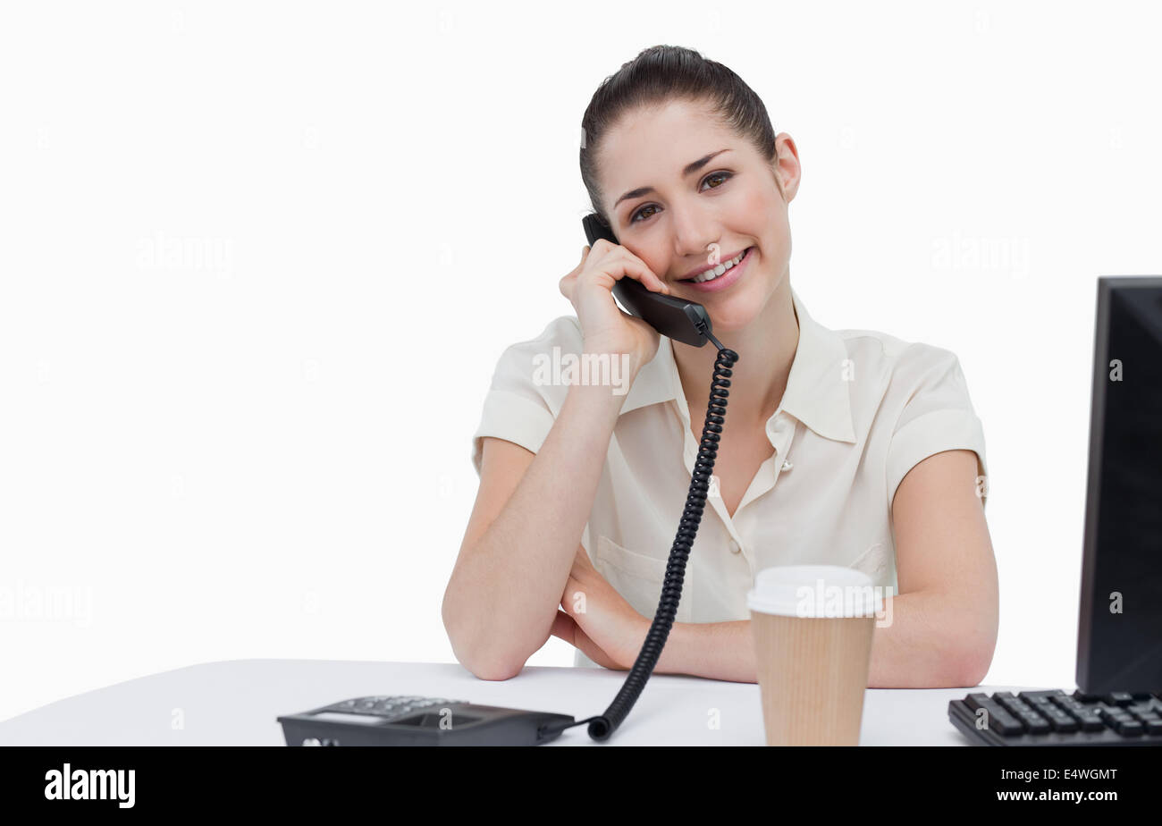 Smiling secretary answering the phone Stock Photo - Alamy