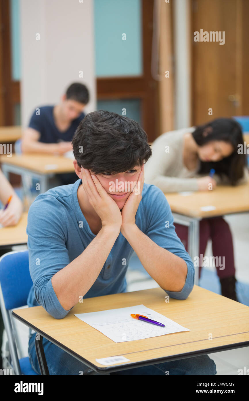 Student looking helpless in exam Stock Photo - Alamy