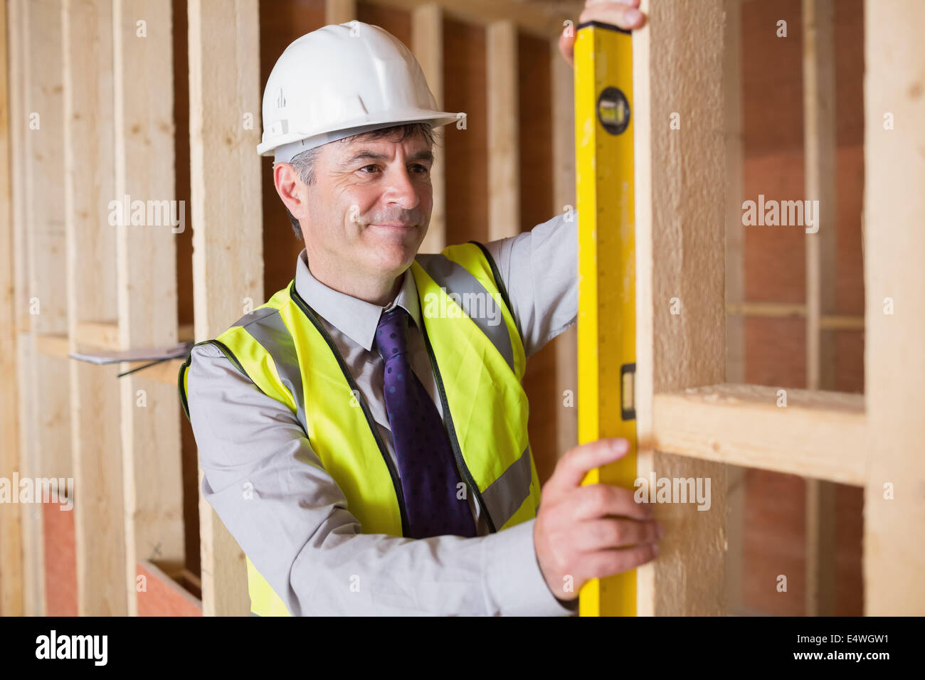 Mature architect holding measuring hi-res stock photography and images ...