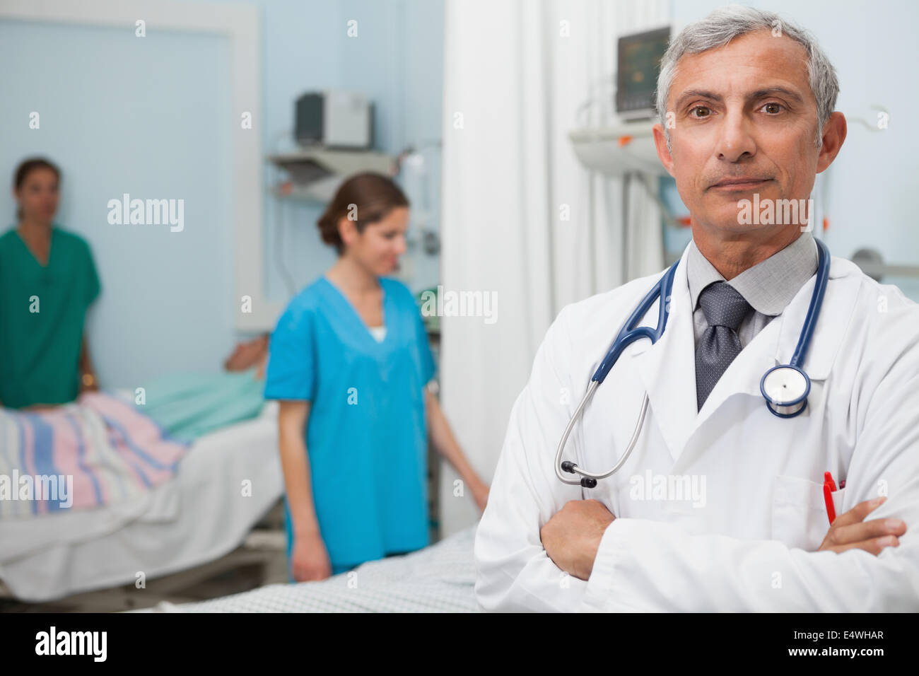 Doctor in hospital room Stock Photo - Alamy