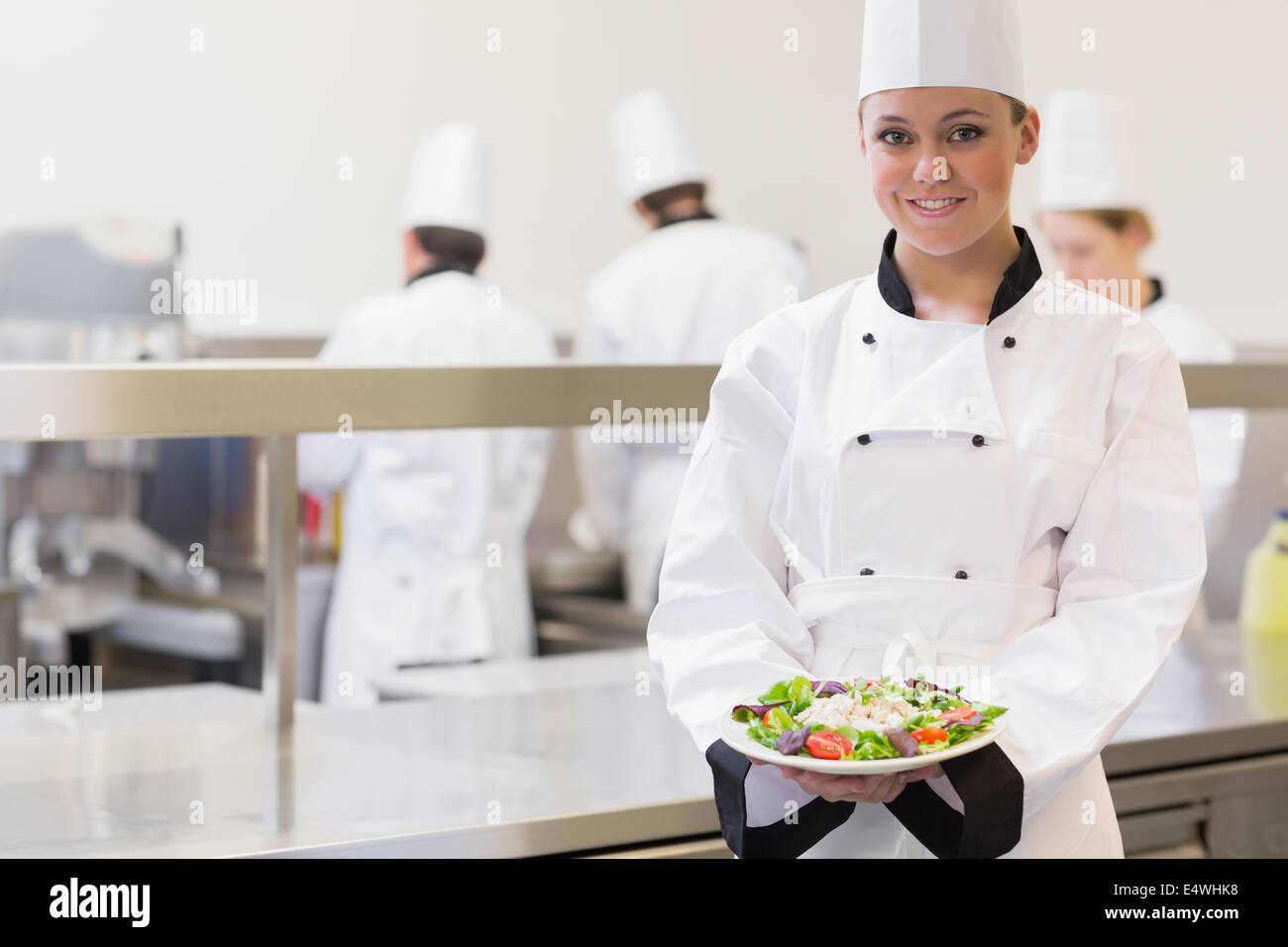 Cheerful chef showing salad hi-res stock photography and images - Alamy