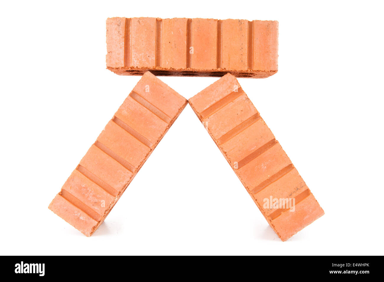 Three clay bricks being piled Stock Photo - Alamy