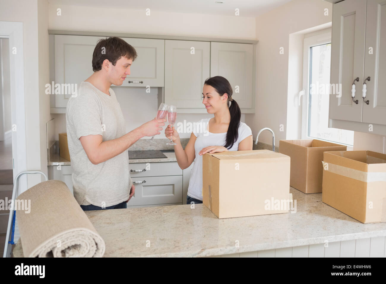 Two people celebrating their move Stock Photo - Alamy