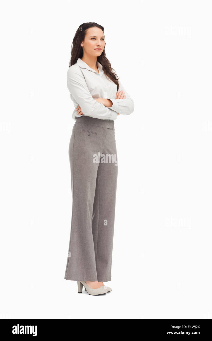 Cute employee with folded arms Stock Photo - Alamy