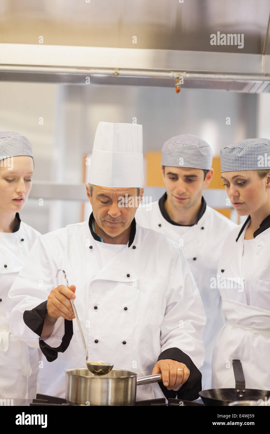 Culinary class learning to make soup Stock Photo - Alamy