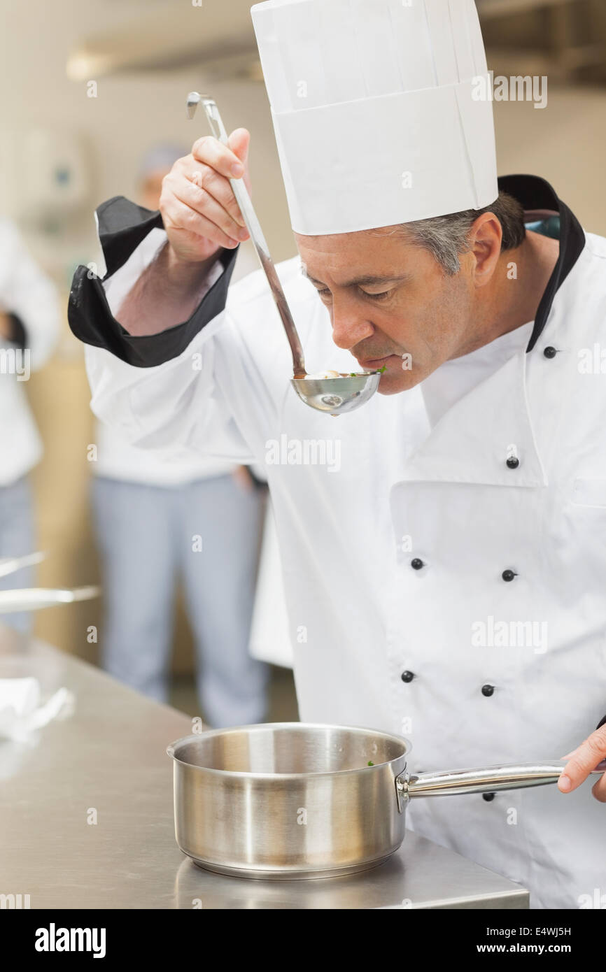 Chef tasting soup Stock Photo - Alamy