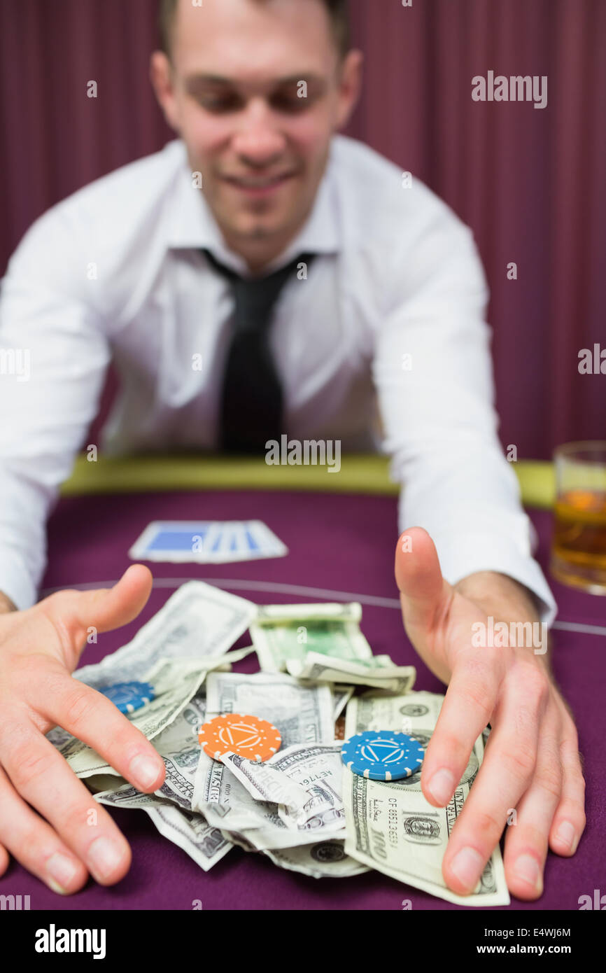 Happy winning poker player hi-res stock photography and images - Alamy