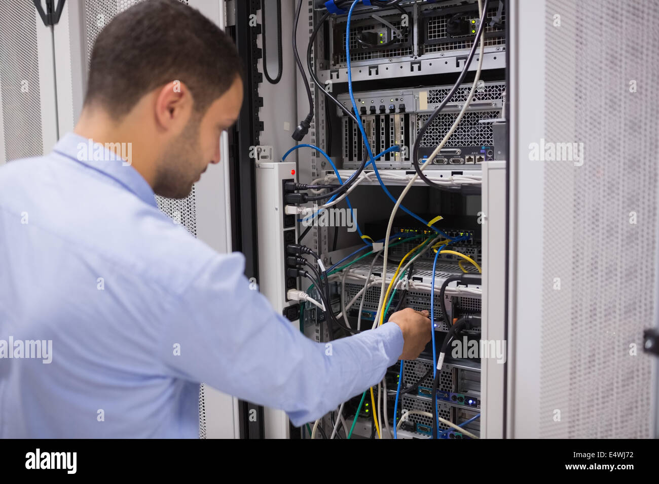 Adjusting computer monitor hi-res stock photography and images - Alamy